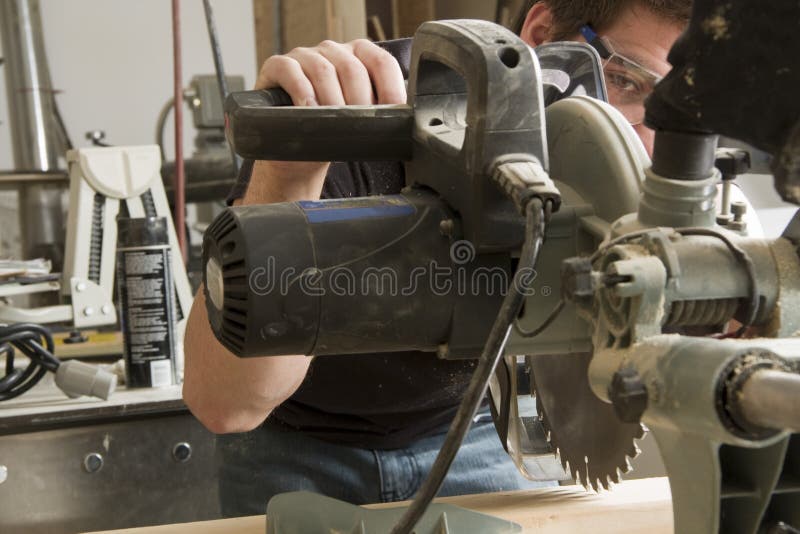 Carpenter at Work on Job Using Power Tool Stock Image - Image of power ...