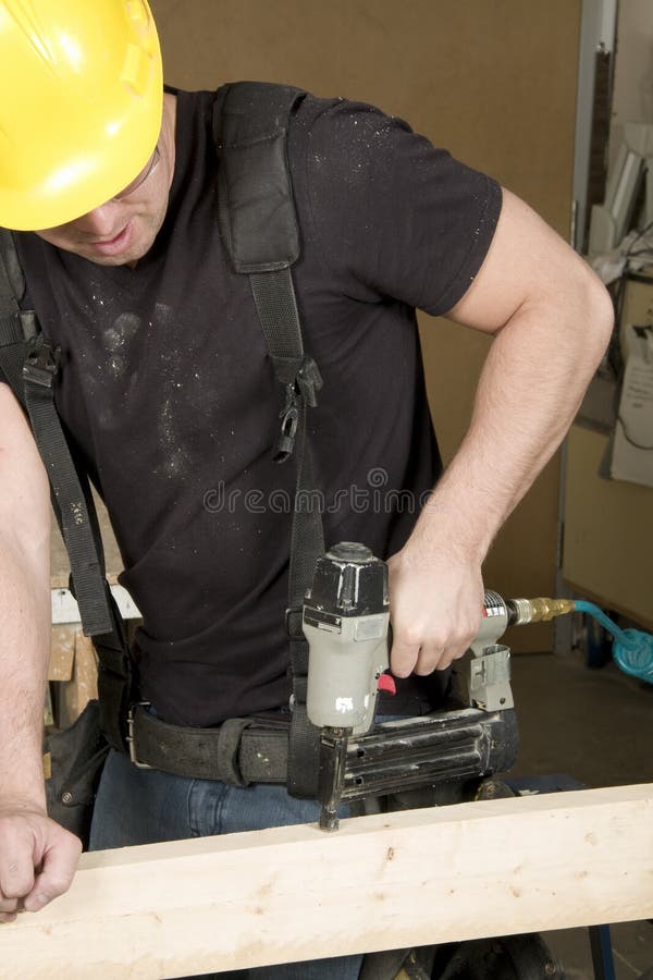 Carpenter at Work on Job Using Power Tool Stock Image - Image of ...