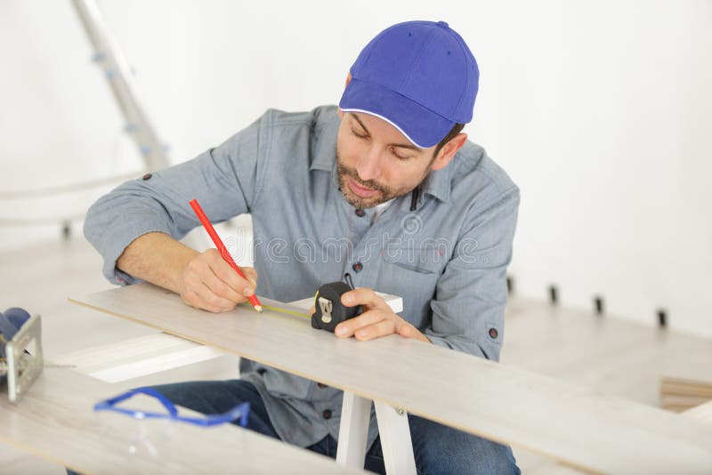 Carpenter at Work Measures with Meter and Pencil Stock Image - Image of ...