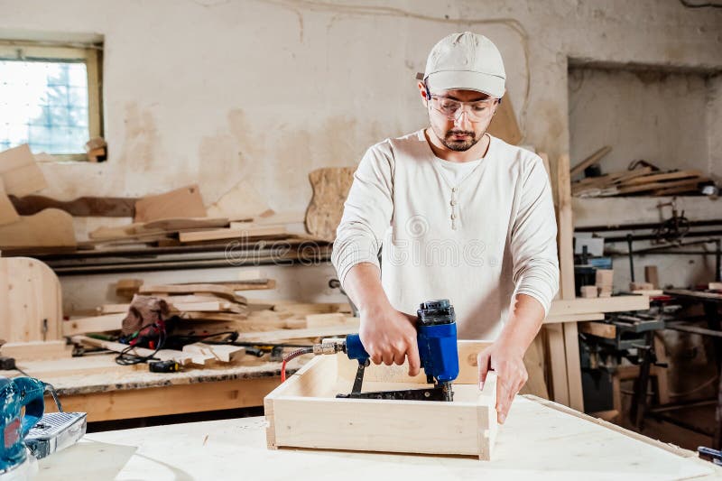 Carpenter at work stock photo. Image of drawer, carpentry - 54719554