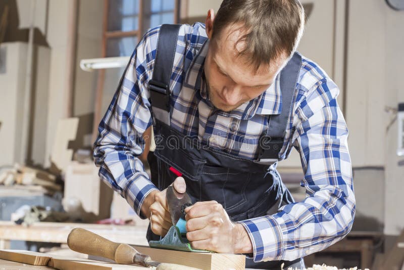 Carpenter at work stock photo. Image of instrument, joiner - 53121042