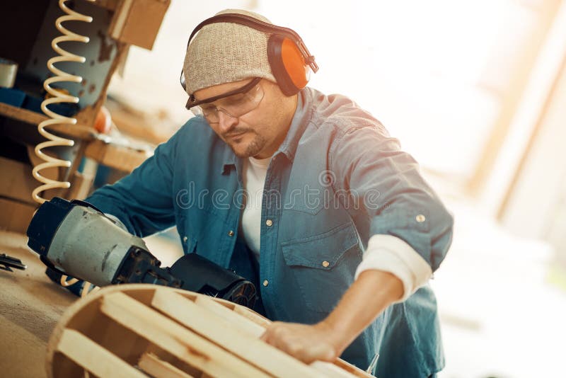 Carpenter at work stock photo. Image of improvement, carpenter - 74919254