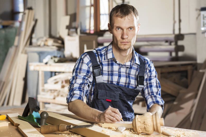 Carpenter at work stock photo. Image of craft, sawdust - 56870772