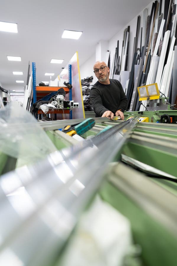 Carpenter Working with Aluminum Profiles in Workshop Stock Photo ...