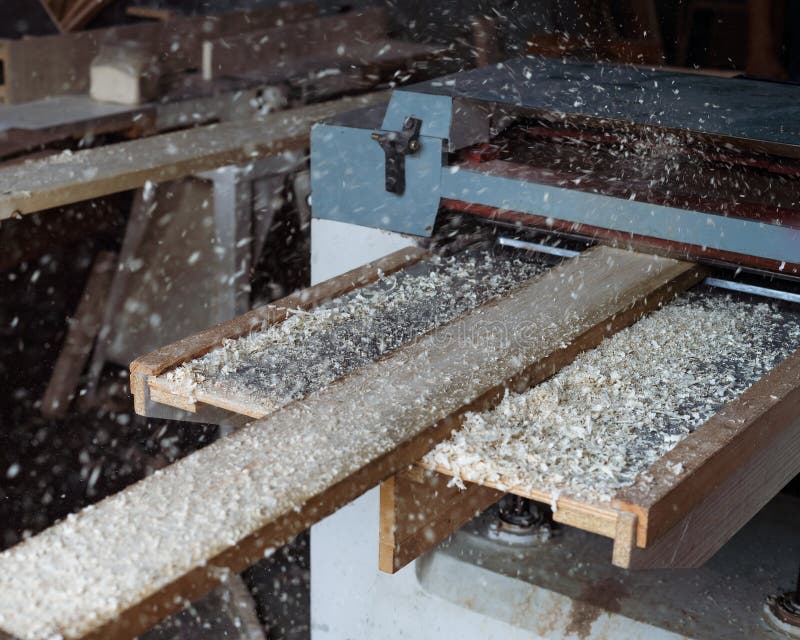 Automated Sanding Machine for Wood Boards. Wood Dusts Scattered ...