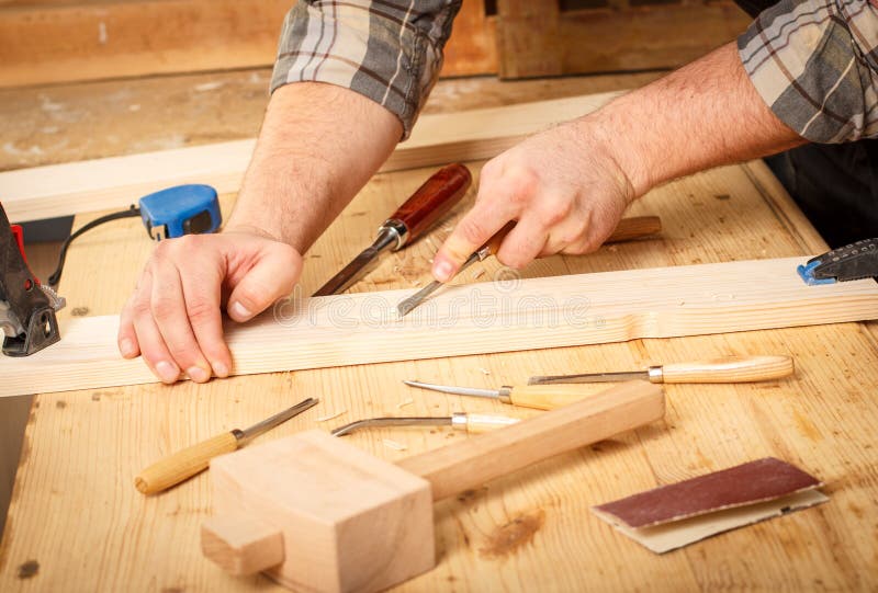 Focused carpenter at work stock photo. Image of measuring - 56162594