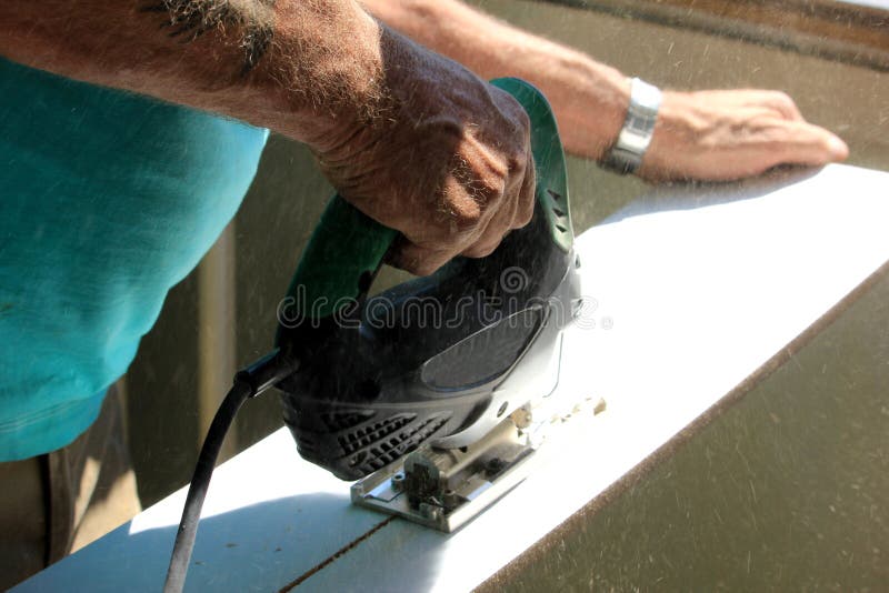 Carpenter Working with Electric Jigsaw Stock Image - Image of wood ...