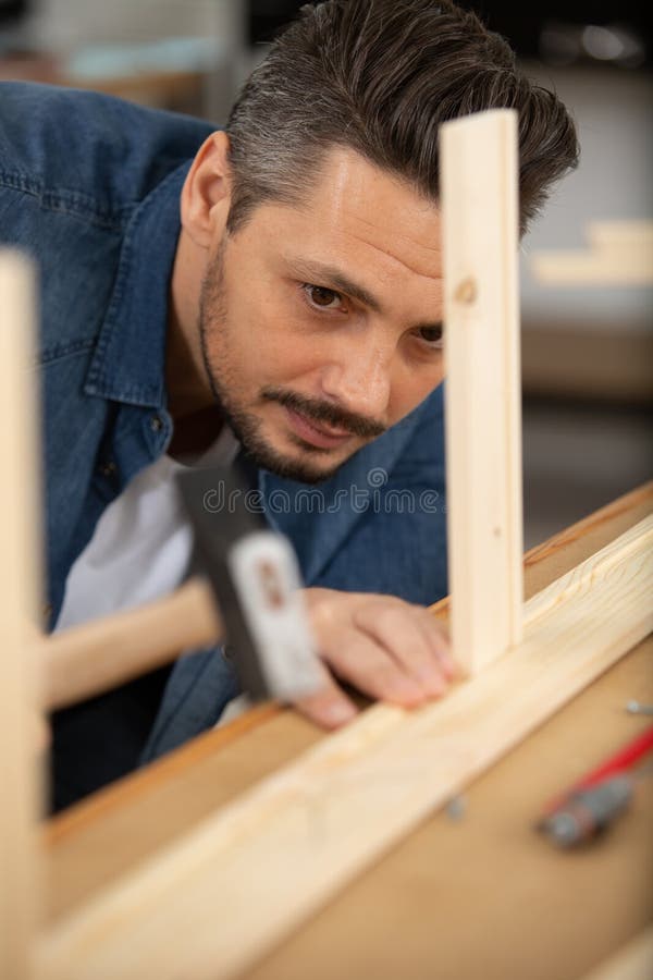 Carpenter Working with Hammer Stock Photo - Image of interior, retro ...