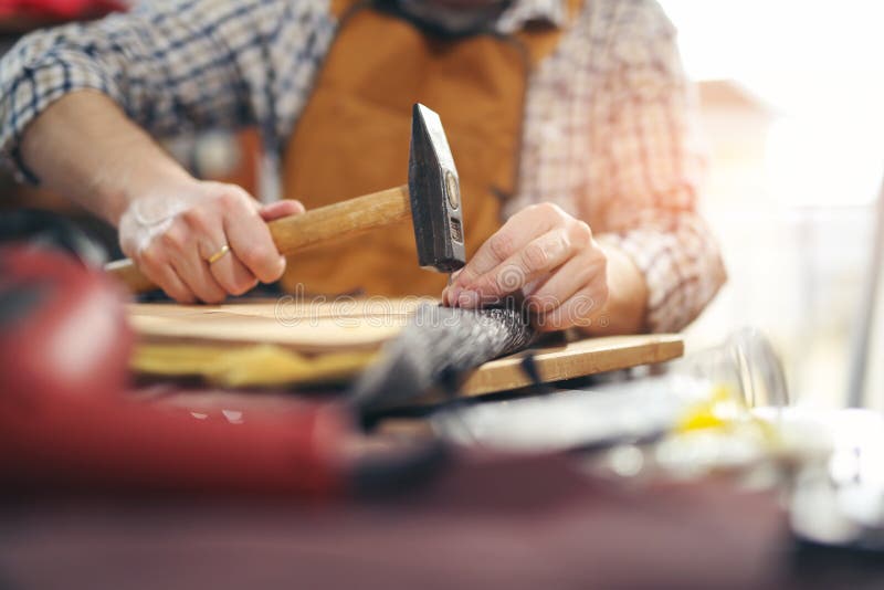 Carpenter Working with Hammer in His Workshop Stock Image - Image of ...