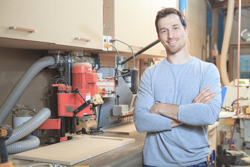 A Carpenter Working Hard at the Workshop Stock Photo - Image of plank ...