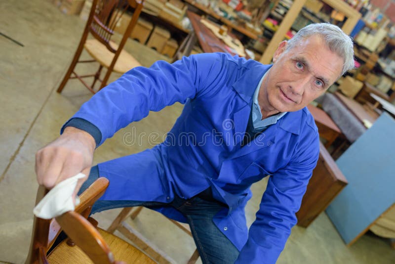 Carpenter Working in Workshop on Chair Stock Image - Image of ...