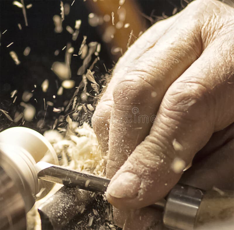 Carpenter Working with a Machine and Splinters All Around Stock Photo ...