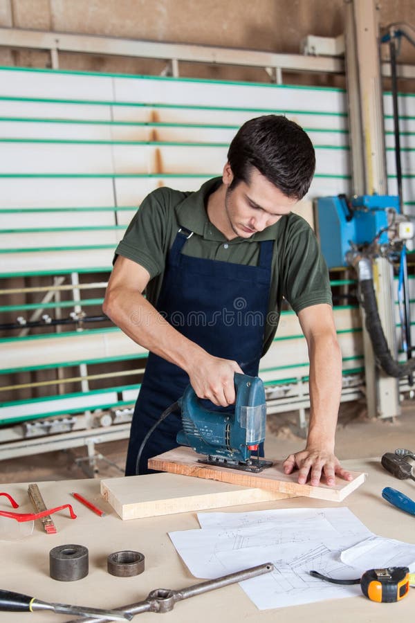 Carpenter Working with a Machine Stock Image - Image of equipment ...