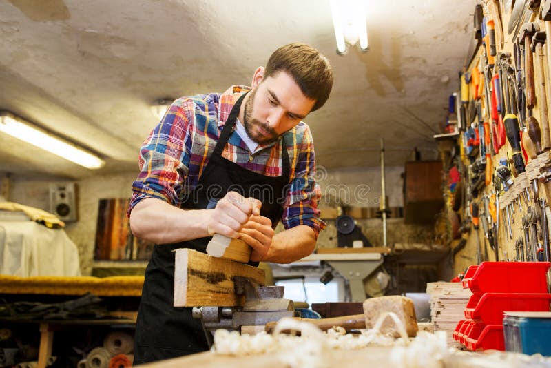 Carpenter Working with Plane and Wood at Workshop Stock Photo - Image ...