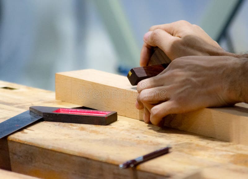 Carpenter Working with Plane on Wooden Stock Image - Image of craft ...
