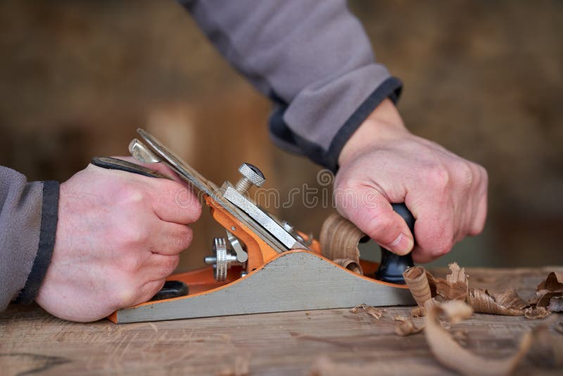 Carpenter Working with Planer Stock Image - Image of professional, home ...
