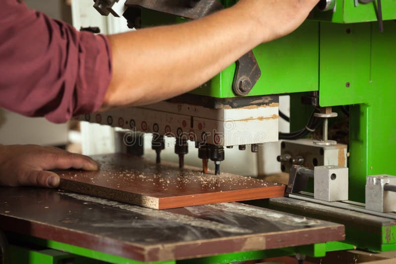 Carpenter Working with Professional Drilling Machine Closeup. Stock ...