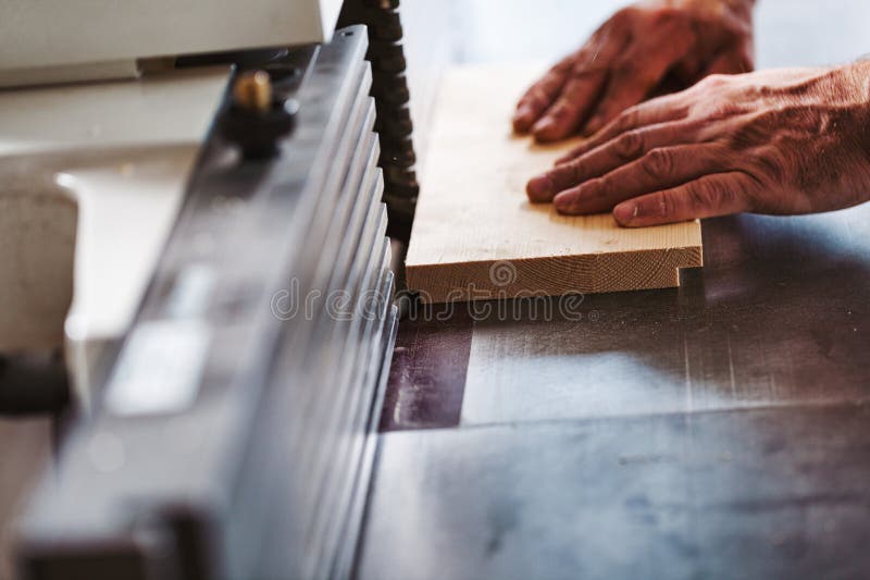 Carpenter Working Wood Plank Using Planer Machine in Workshop Stock ...