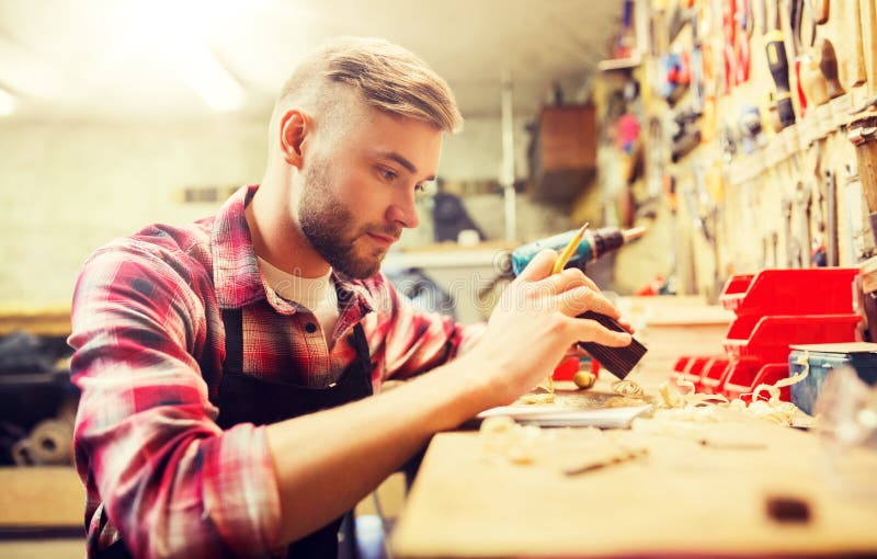 Carpenter Working with Wood Plank at Workshop Stock Photo - Image of ...