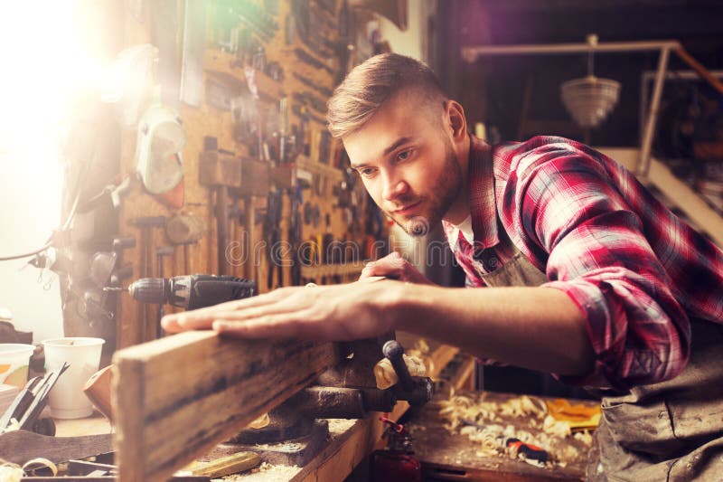 Carpenter Working with Wood Plank at Workshop Stock Photo - Image of ...