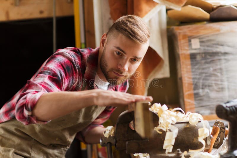 Carpenter Working with Wood Plank at Workshop Stock Photo - Image of ...