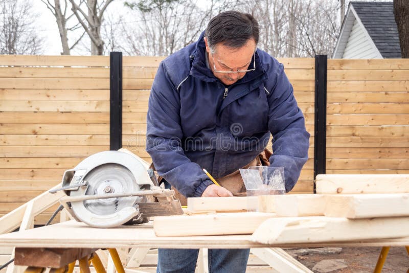 Carpenter Working on Wood Structure Stock Photo - Image of occupation ...