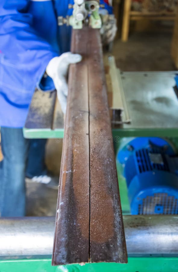 Carpenter Workplace. Man Using Saw To Cut Wood Stock Photo - Image of ...