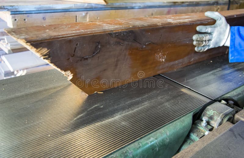 Carpenter Workplace. Man Using Saw To Cut Wood Stock Photo - Image of ...