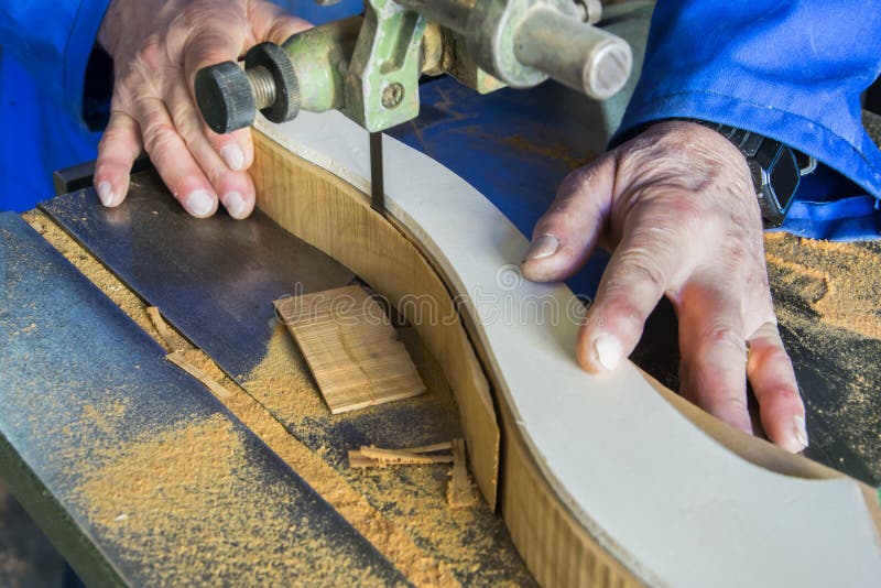 Carpenter Workplace. Man Using Saw To Cut Wood Stock Photo - Image of ...