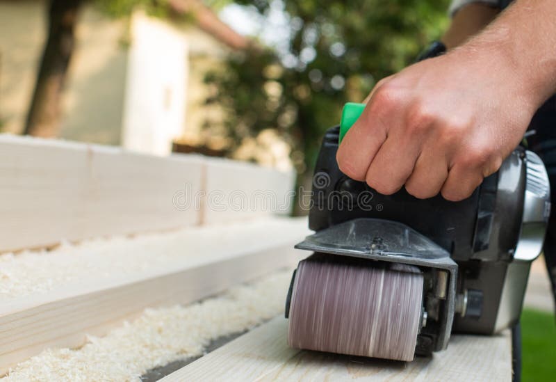 Carpenter Works with Belt Sander Stock Photo - Image of work, carpentry ...