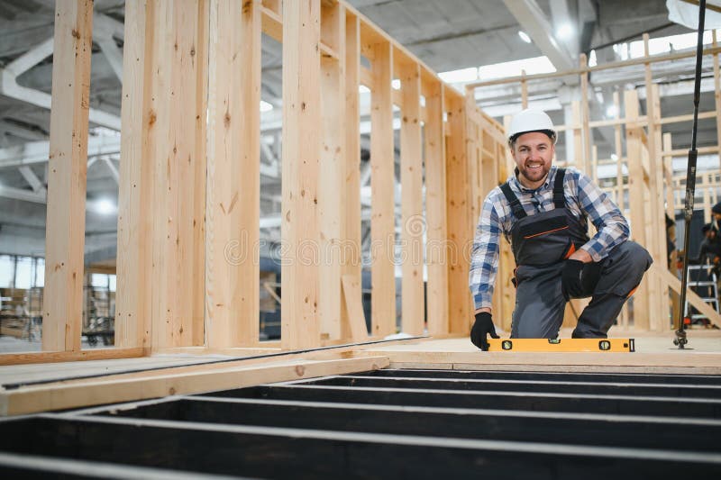 A Carpenter Works on the Construction of Modular Houses Stock Image ...