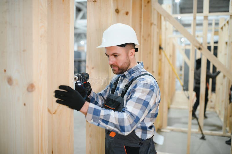 A Carpenter Works on the Construction of Modular Houses Stock Image ...