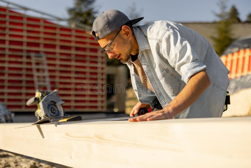 Carpenter Works on a Construction Site Outdoors Stock Image - Image of ...