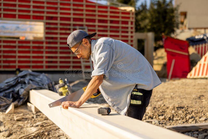 Carpenter Works on a Construction Site Outdoors Stock Photo - Image of ...
