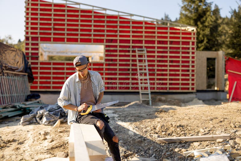 Carpenter Works on a Construction Site Outdoors Stock Photo - Image of ...