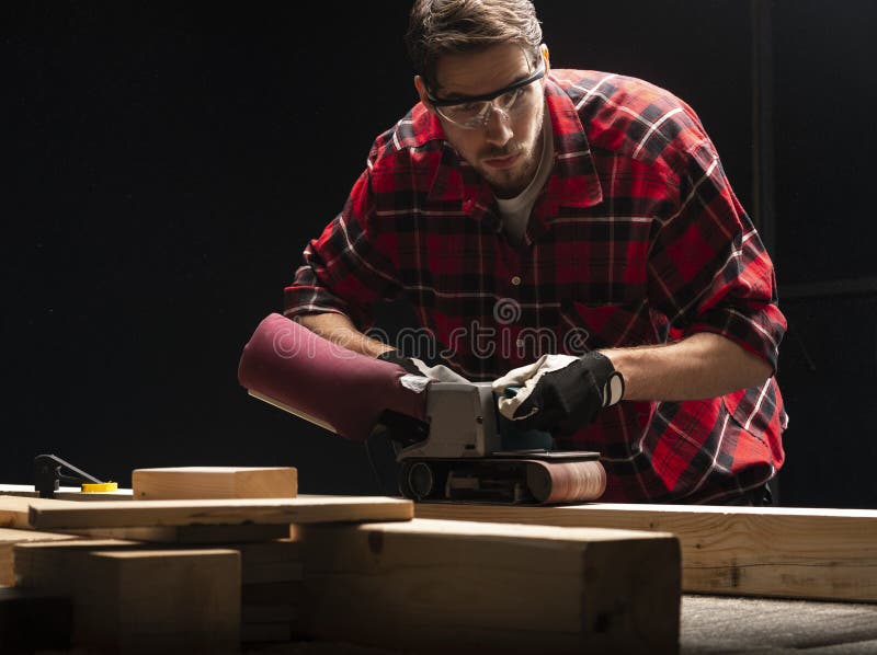 Carpenter Works with Electrical Planer Stock Photo - Image of ...