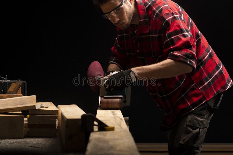 Carpenter Works with Electrical Planer Stock Photo - Image of ...