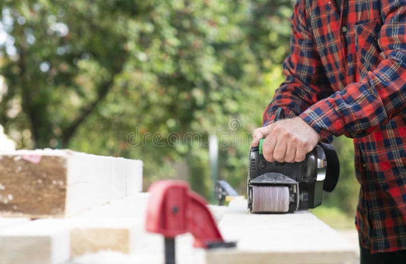 Carpenter Works with Electrical Planer Stock Image - Image of ...