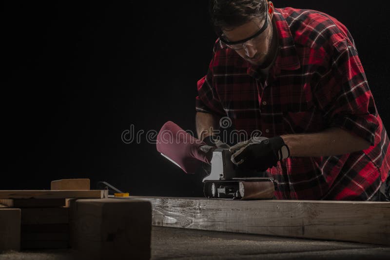 Carpenter Works with Electrical Planer Stock Photo - Image of ...