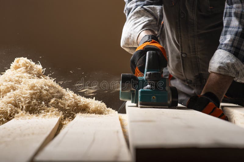 Carpenter Works with Electrical Planer Stock Image - Image of craft ...