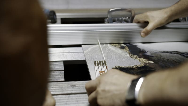 A Carpenter Works on Industrial Machine Tool at the Workshop. Creative ...