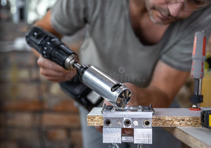 A Carpenter Works with Professional Woodworking Tools Stock Image ...