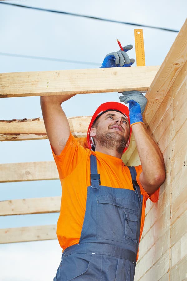 Carpenter works on roof stock image. Image of frame, measure - 35780727