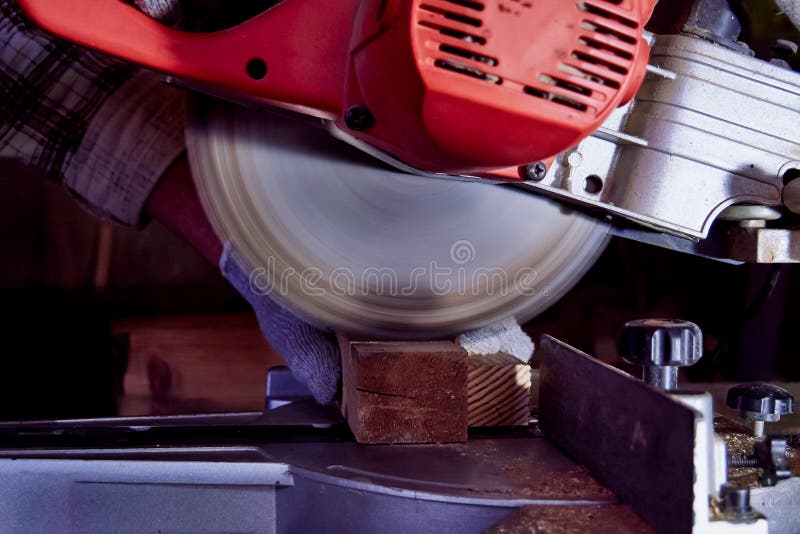 Carpenter Works on Woodworking Machines in the Carpentry Workshop ...