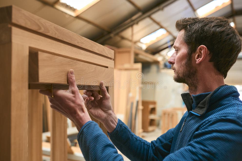 Carpenter in Workshop Gluing Wood To Window Frame Stock Image - Image ...
