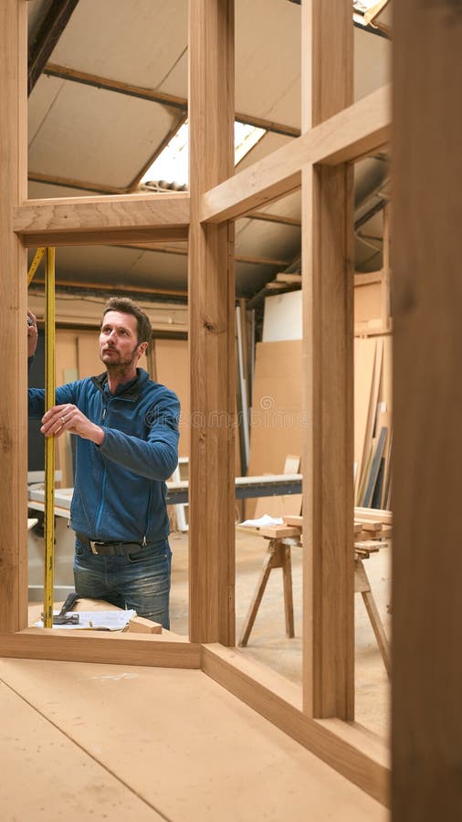 Carpenter in Workshop Measuring Wooden Window Frame Stock Photo - Image ...