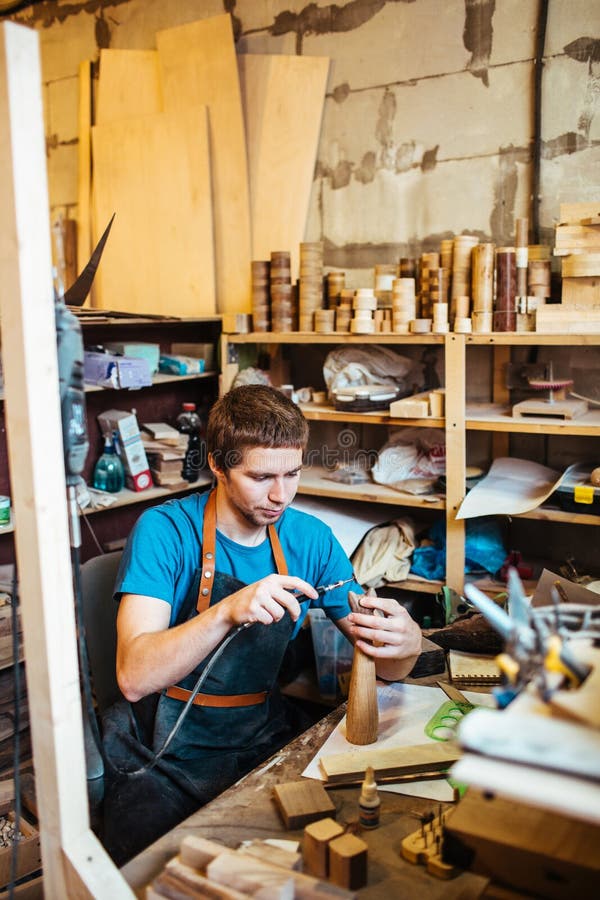 Carpenters Apprentice in Workshop Stock Photo - Image of making ...