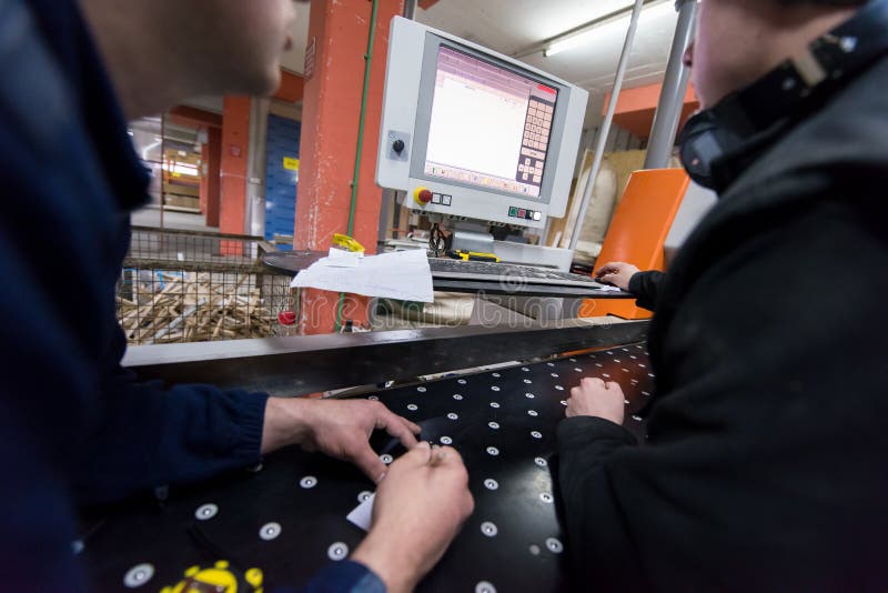 Carpenters Calculating and Programming a Cnc Wood Working Machine Stock Photo - Image of ...