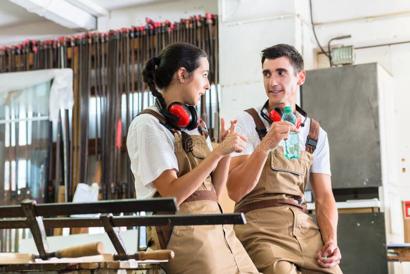 Carpenters Having Break from Their Work Stock Image - Image of together ...