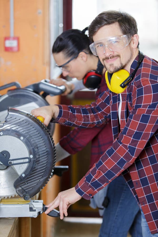 Carpenters Using Circular Saw in Workshop Stock Image - Image of skill ...